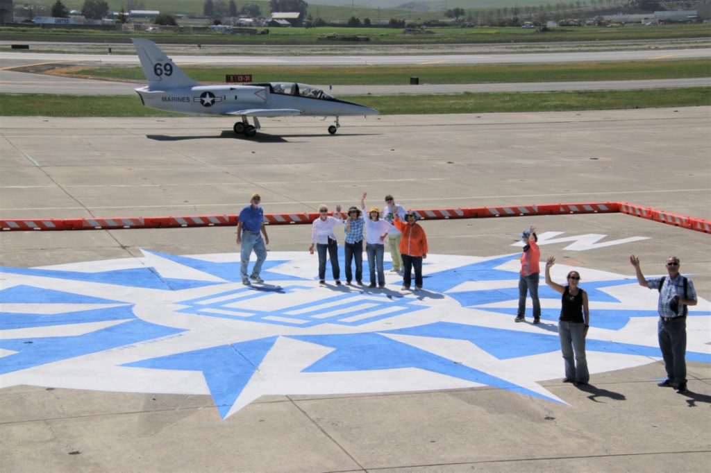 Compass rose at the Hollister airport gets a needed paint job | BenitoLink
